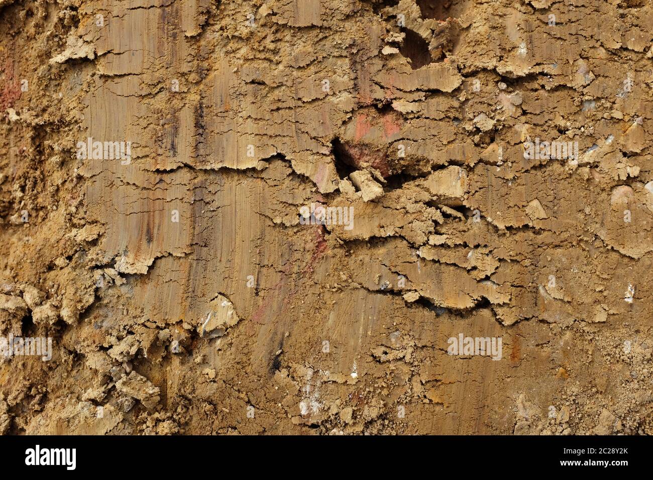 Scraped smooth golden brown Weald clay - abstract earth background ...
