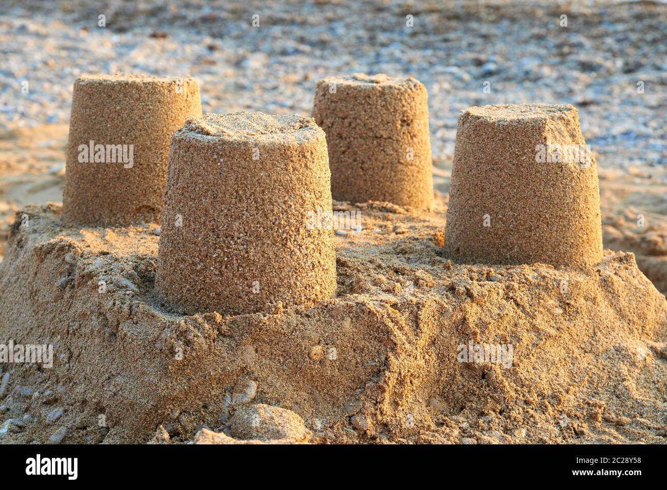 Towers from sand- castle on the beach Stock Photo - Alamy
