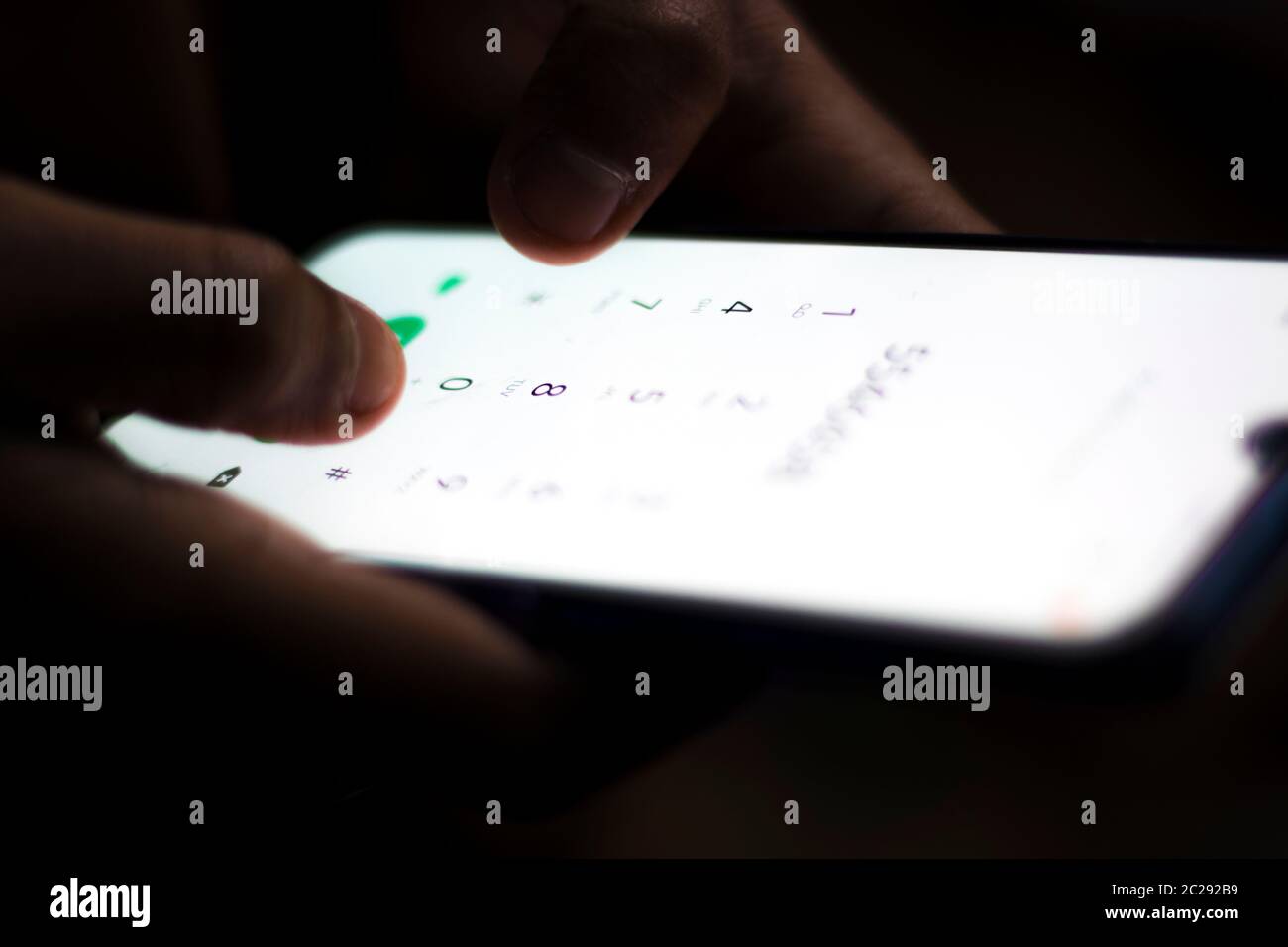 hand writing on mobile keyboard Stock Photo - Alamy