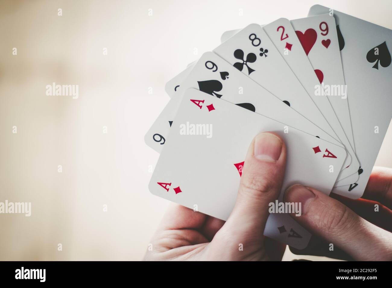 Hand Holding A Playing Card High Resolution Stock Photography and ...