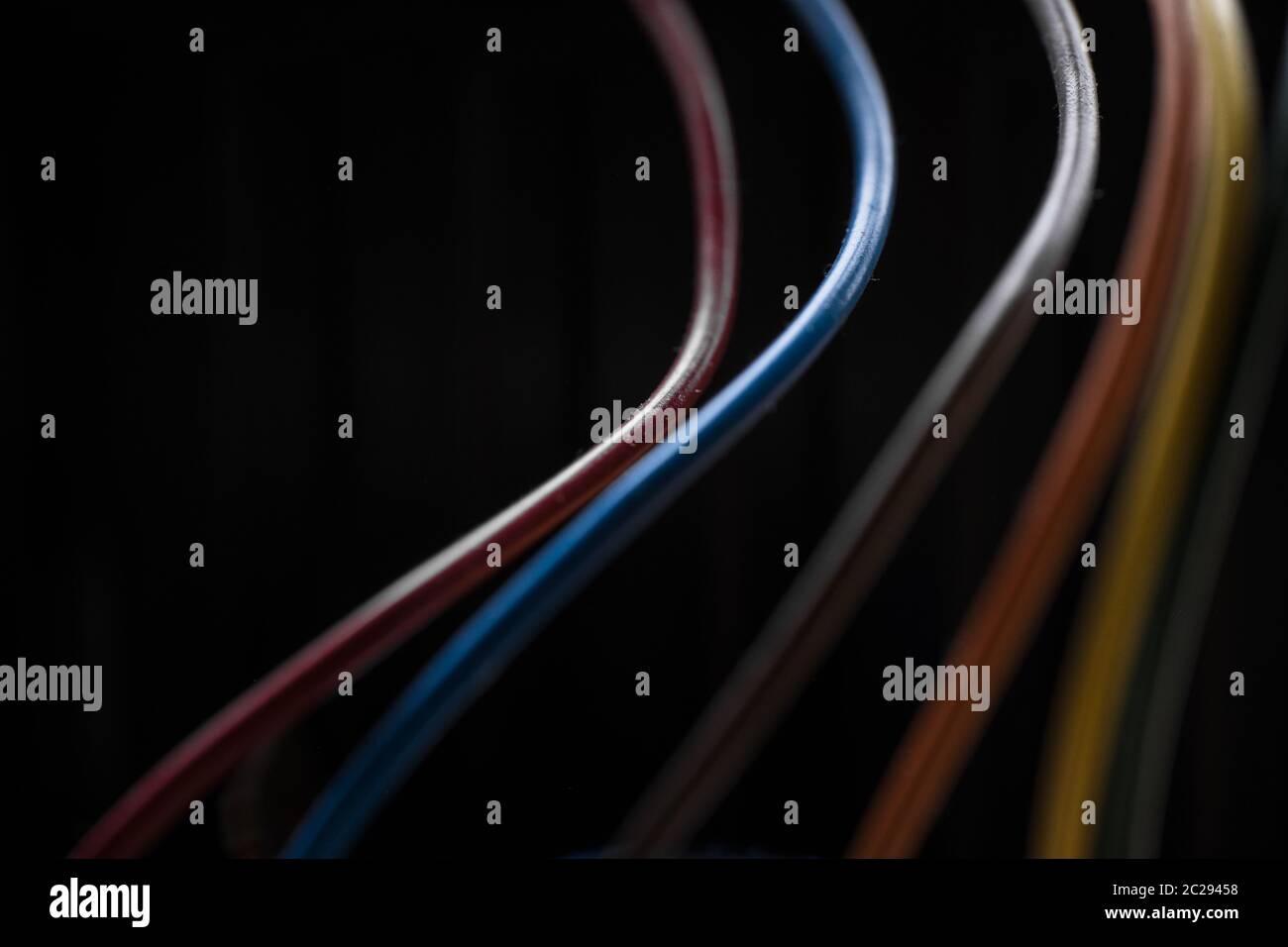 Colored power cables that come from a transformer Stock Photo - Alamy