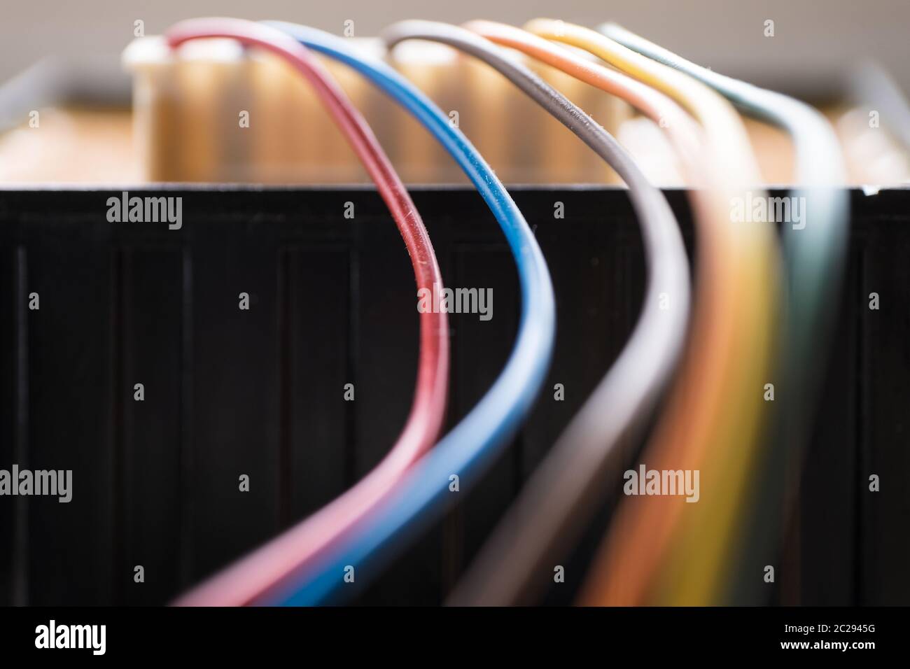 Colored power cables that come from a transformer Stock Photo - Alamy