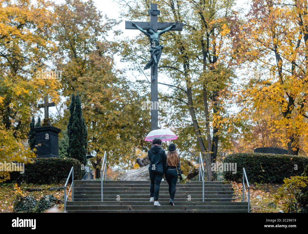 Couple walking in cemetery in hi-res stock photography and images - Alamy