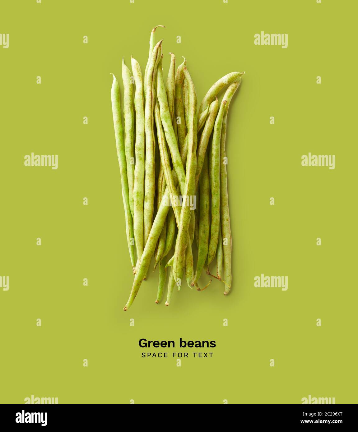 Creative layout with isolated green beans on green background. Top view ...