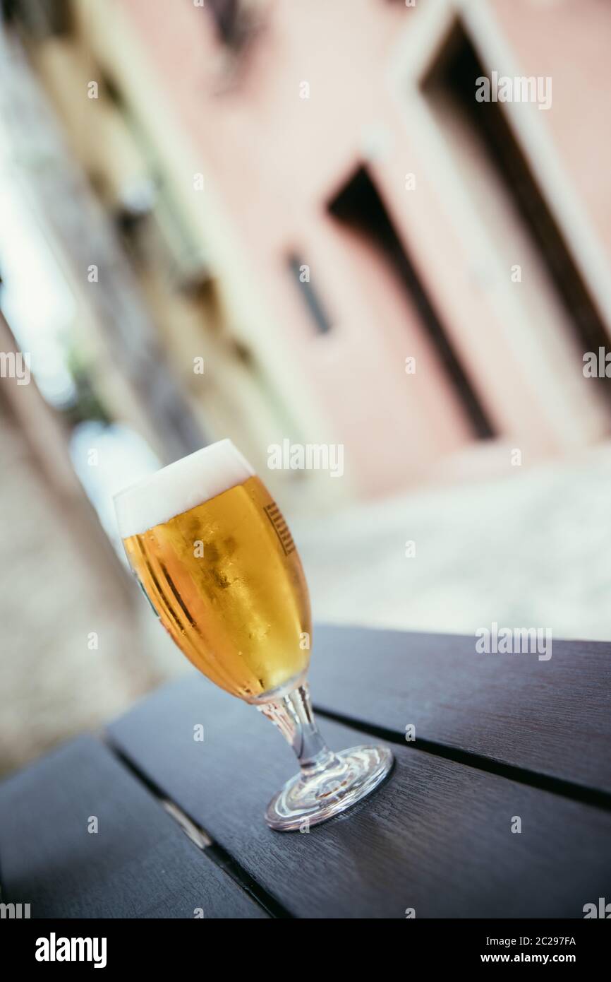 Enjoying a glass of beer in the holidays, Italy Stock Photo - Alamy