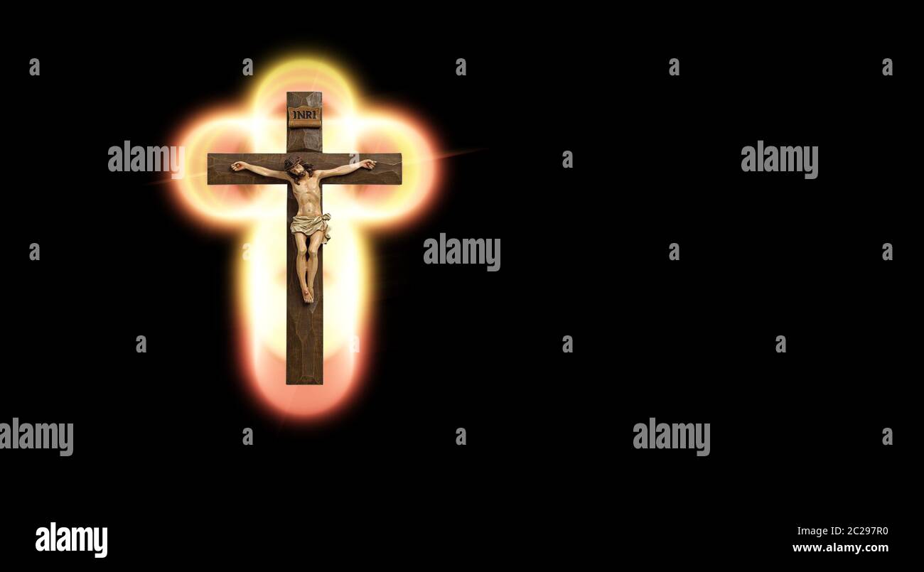 Jesus Christ on the cross in the glare of aura Stock Photo - Alamy
