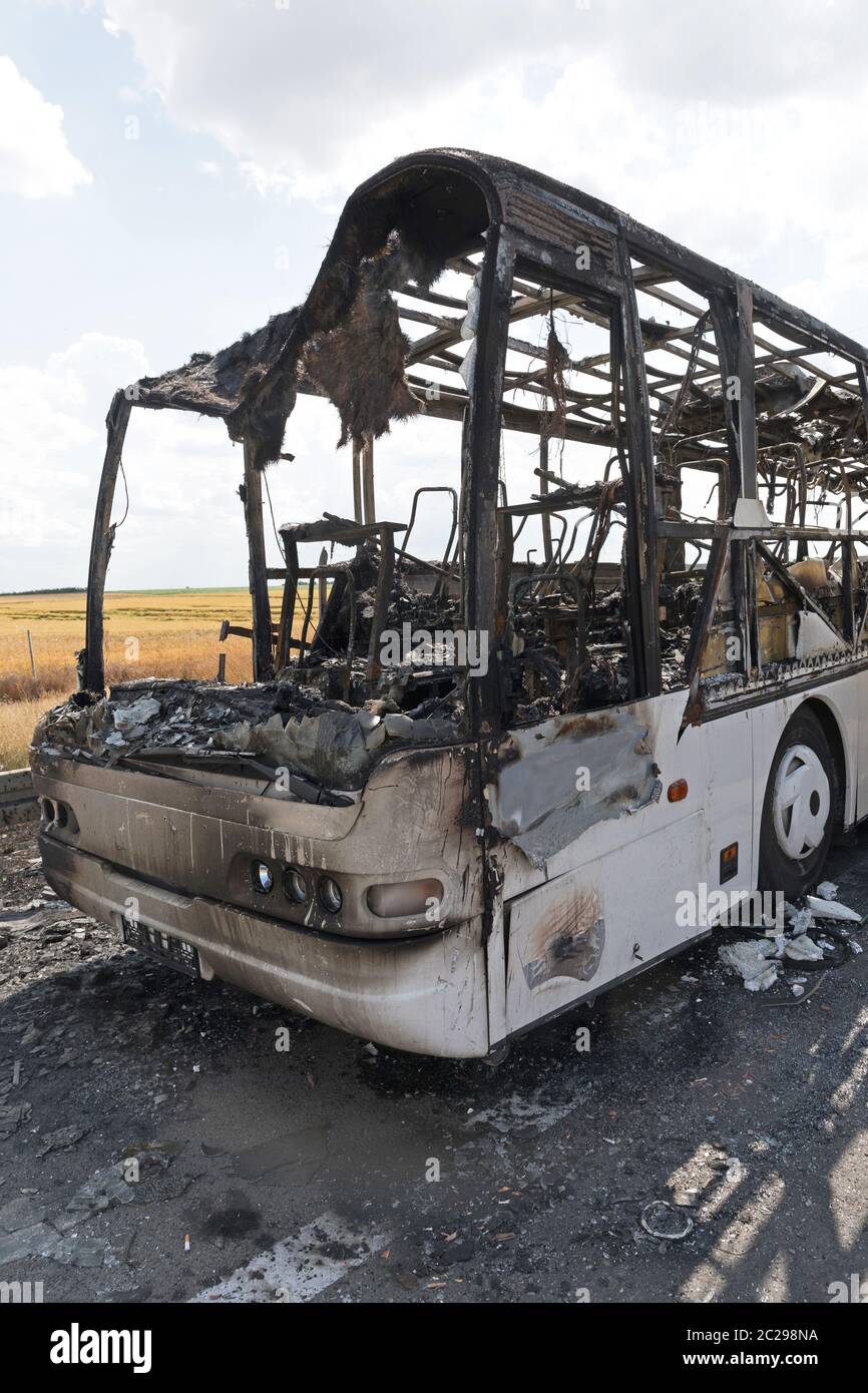 Burned Coach Bus Vehicle at Highway Accident Stock Photo - Alamy