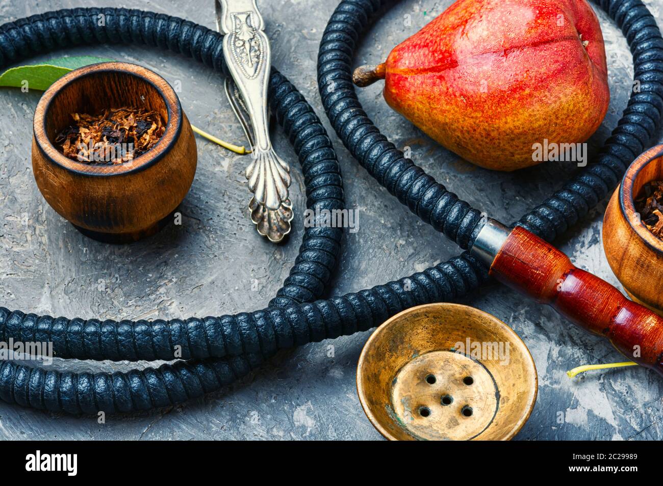Smoking hookah.Details of Turkish kalian.Shisha with a fruity aroma of ...