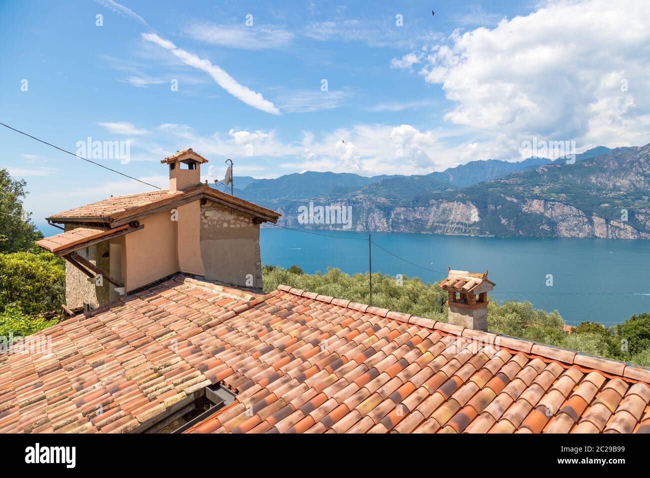 Roof of an Italian house, red shingles Stock Photo - Alamy