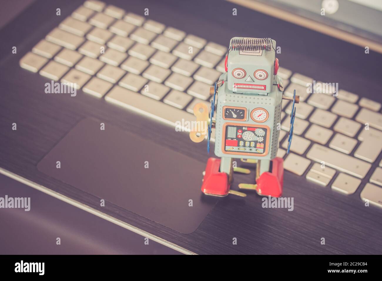 Symbol for a chat bot or social bot and algorithms, Laptop Stock Photo ...