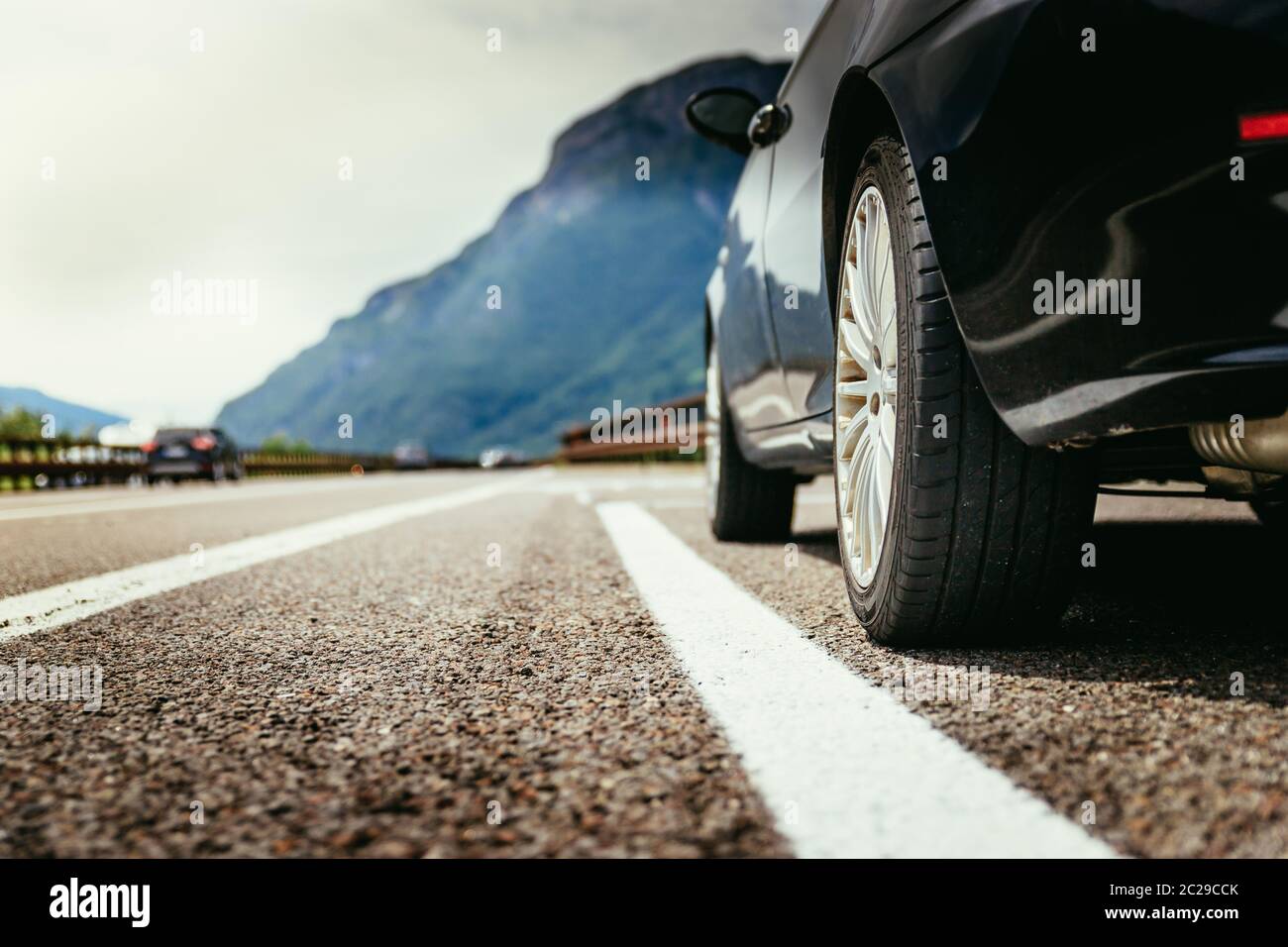 Car is standing on the breakdown lane, asphalt and tyre, Italy Stock ...