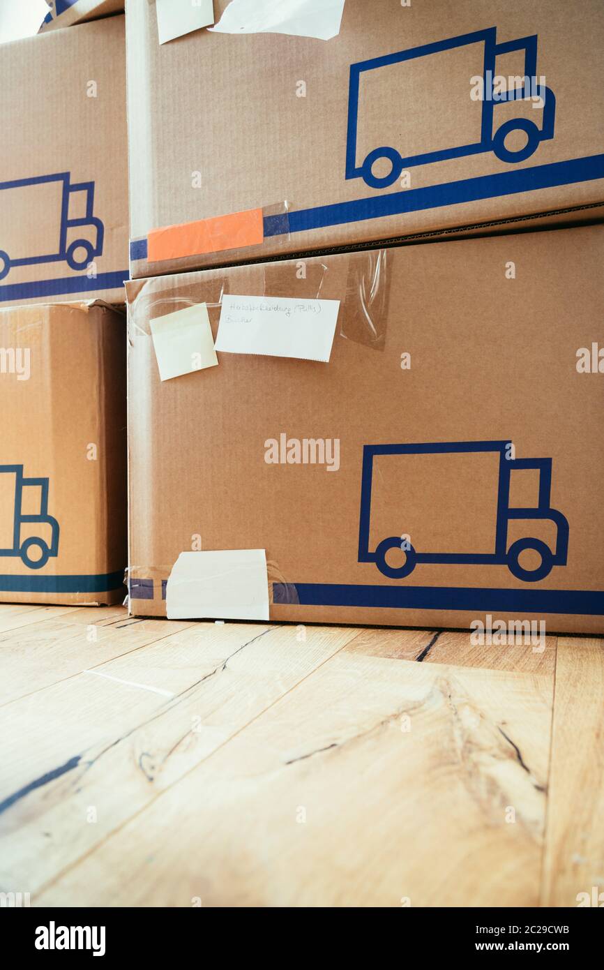 Move. Cardboard, boxes and stuff for moving into a new home Stock Photo ...