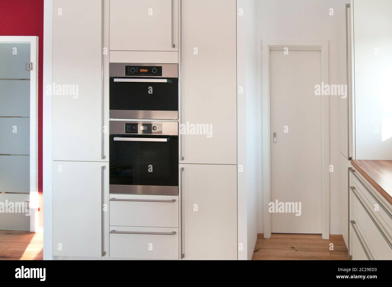 Fitted stove in modern new kitchen Stock Photo - Alamy