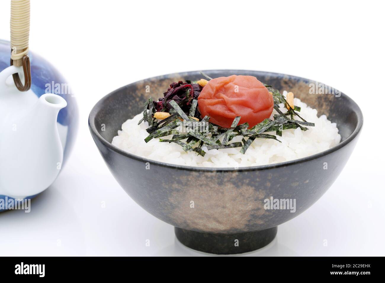 Japanese food, Rice chazuke or ochazuke with umeboshi and shiso, on ...