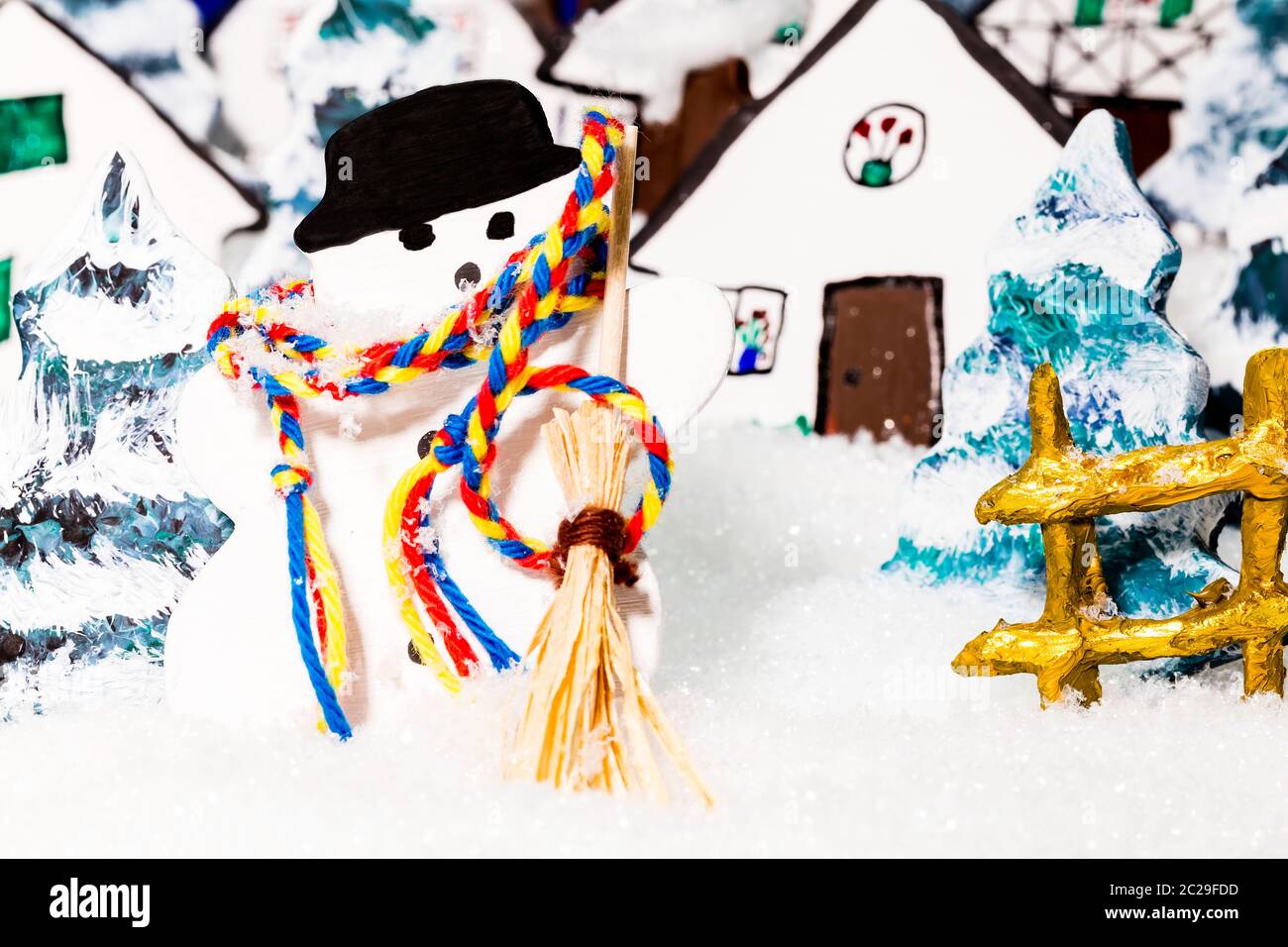 Snowmen sweeping snow hi-res stock photography and images - Alamy