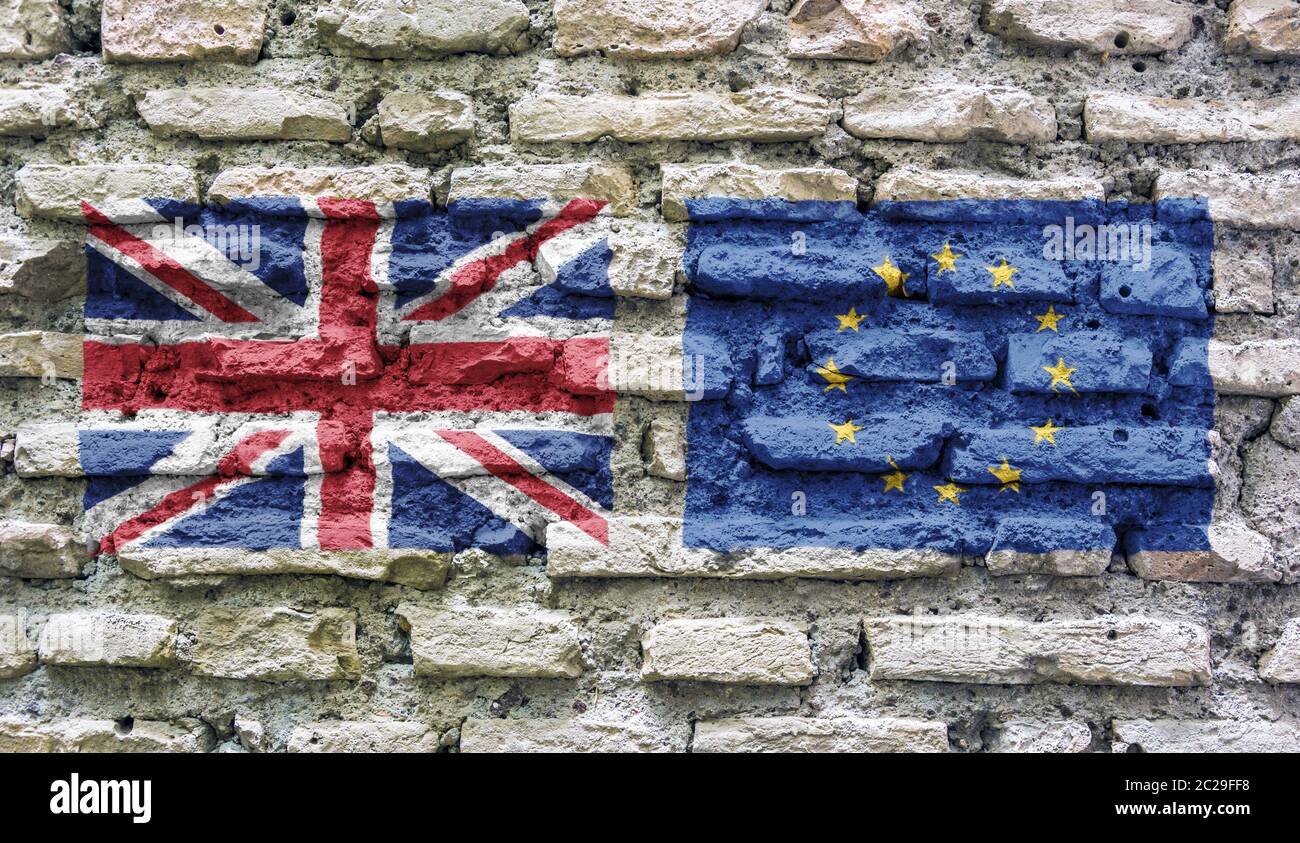 The flag of England and the European Union imprinted on an old ruined ...