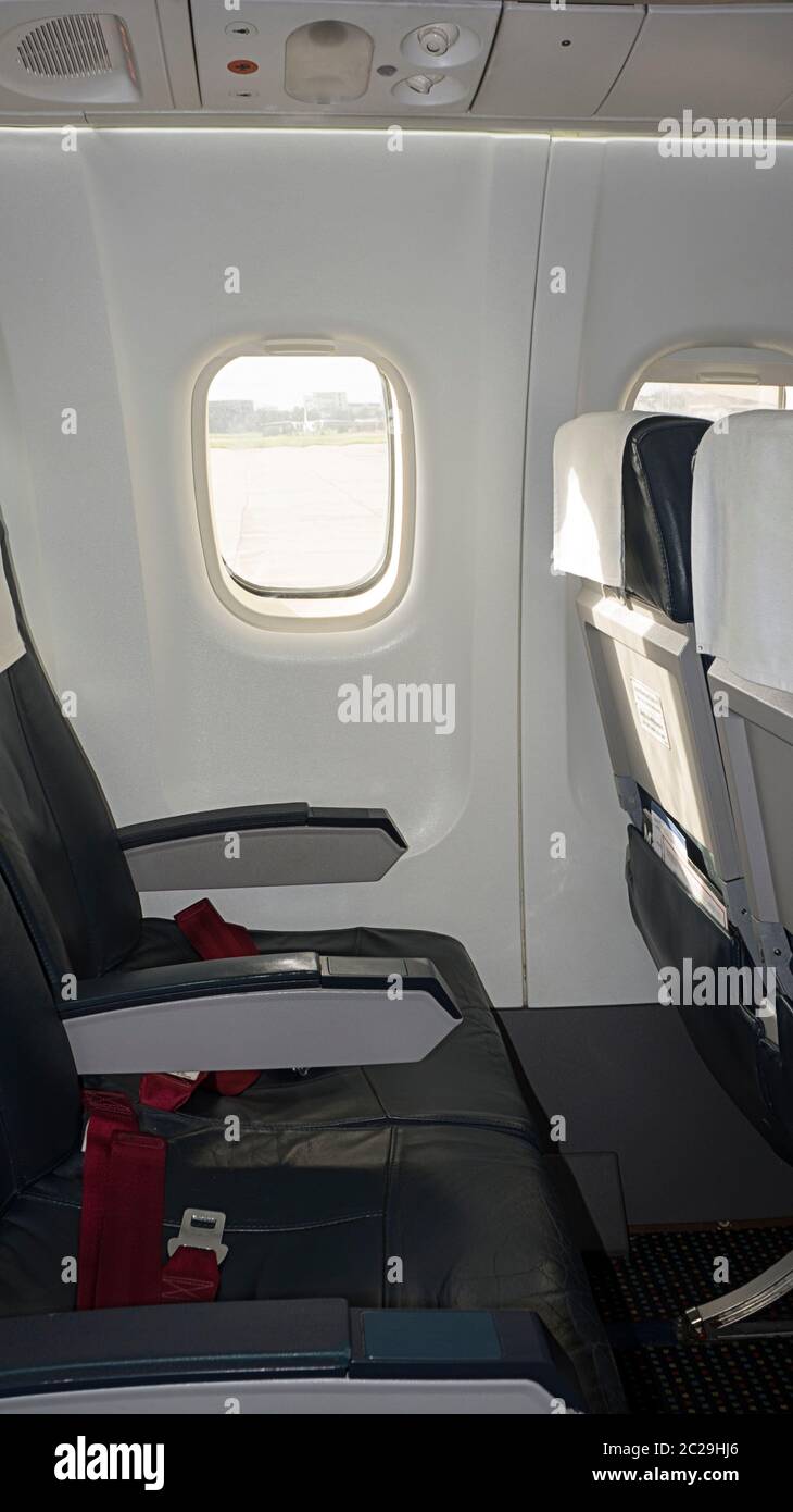 airplane seat indoor empty row window travel Stock Photo - Alamy