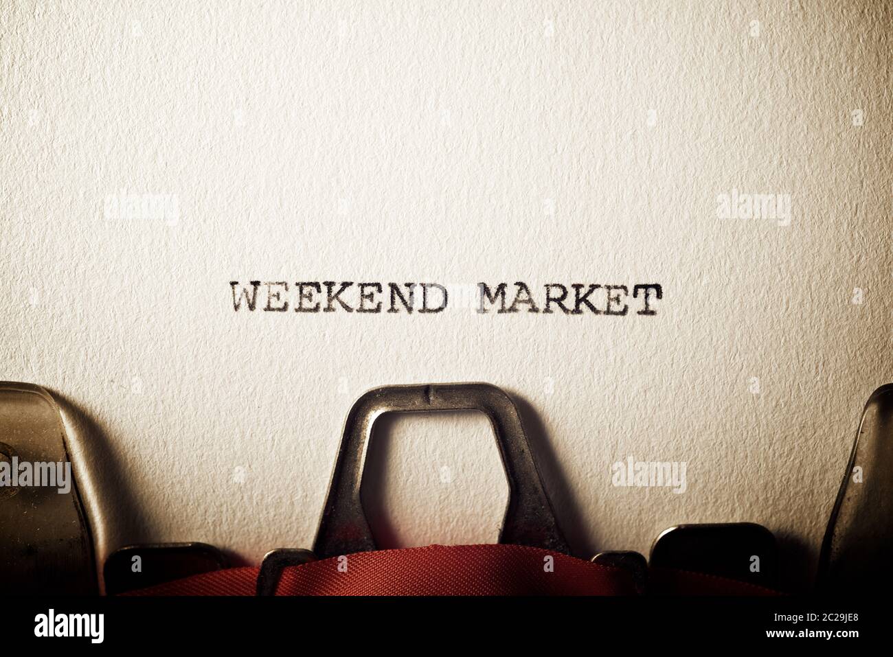 The sentence weekend market written with a typewriter Stock Photo - Alamy