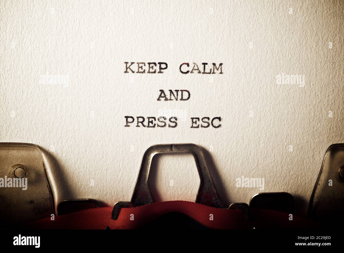 Keep calm and press esc text written with a typewriter Stock Photo - Alamy