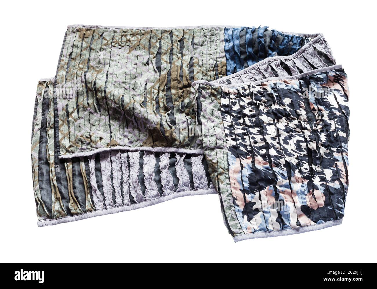 folded scarf stitched from carved silk and cotton fabric isolated on ...