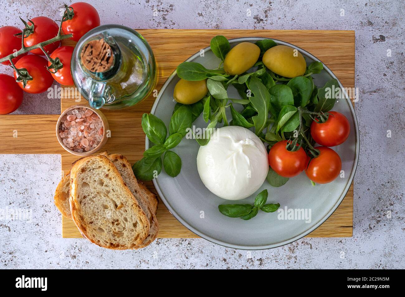 Burrata, fresh italian cheese made from mozzarella and cream Stock ...