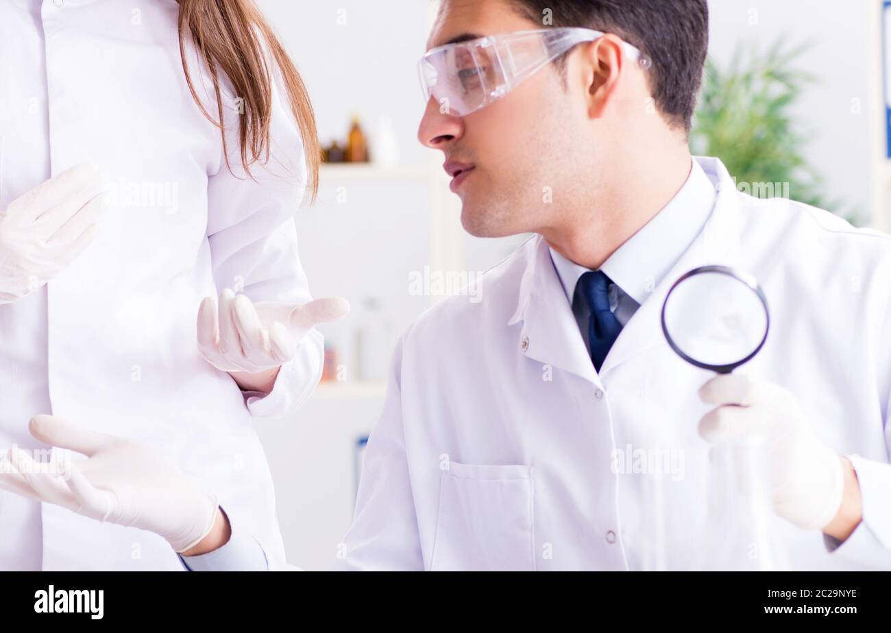 Two lab doctor testing food products Stock Photo - Alamy