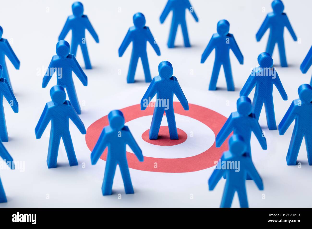 Blue Human Figure And Darts Target On White Background Stock Photo - Alamy