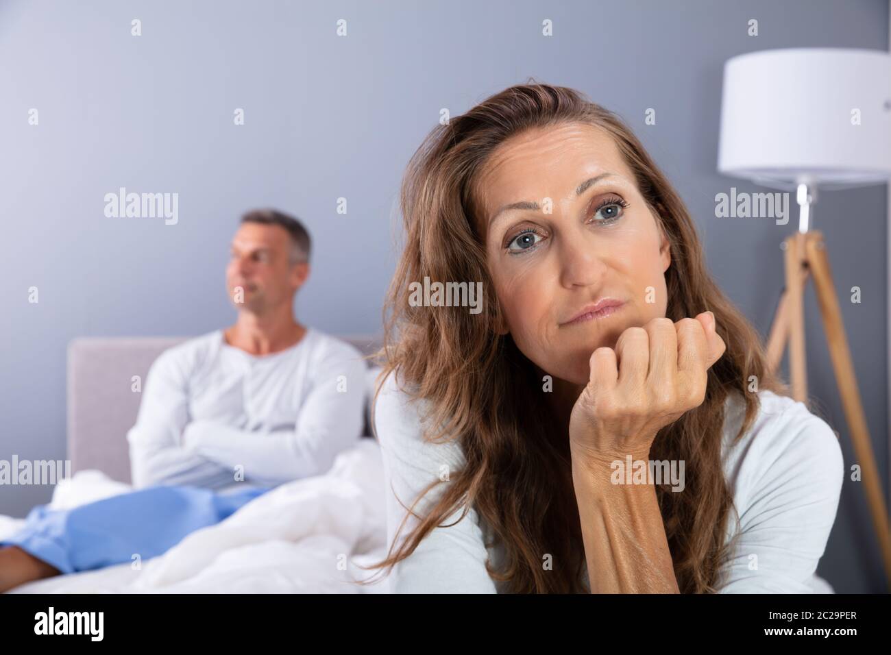 Sad mature couple bed hi-res stock photography and images - Alamy