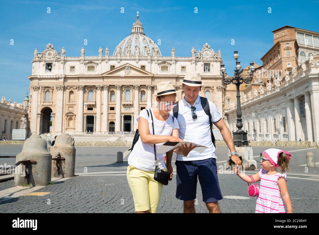 Family With Kid In Front Of St. Peter's Basilica in the Vatican Stock ...