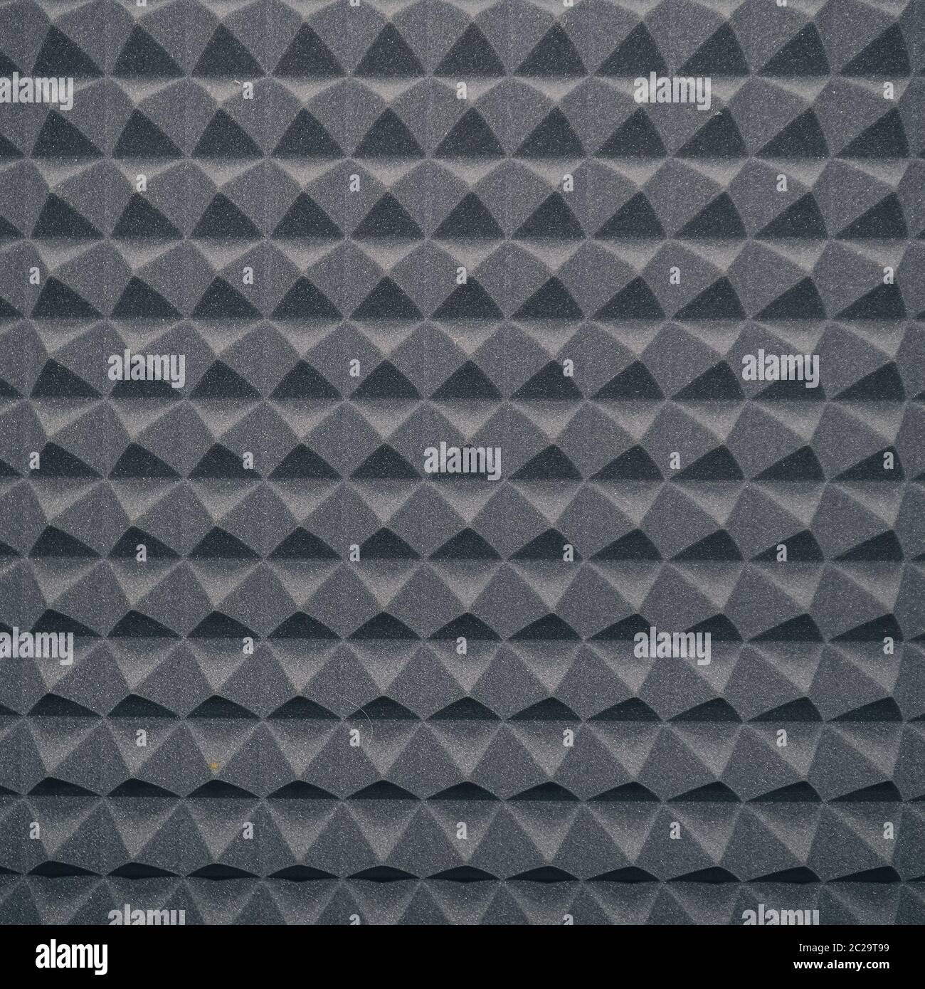 Soundproofing foam rubber texture with convex triangles in studio Stock ...