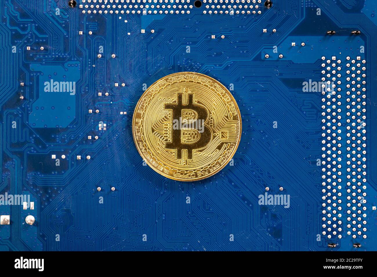Bitcoin coin and printed circuit board PCB Stock Photo - Alamy