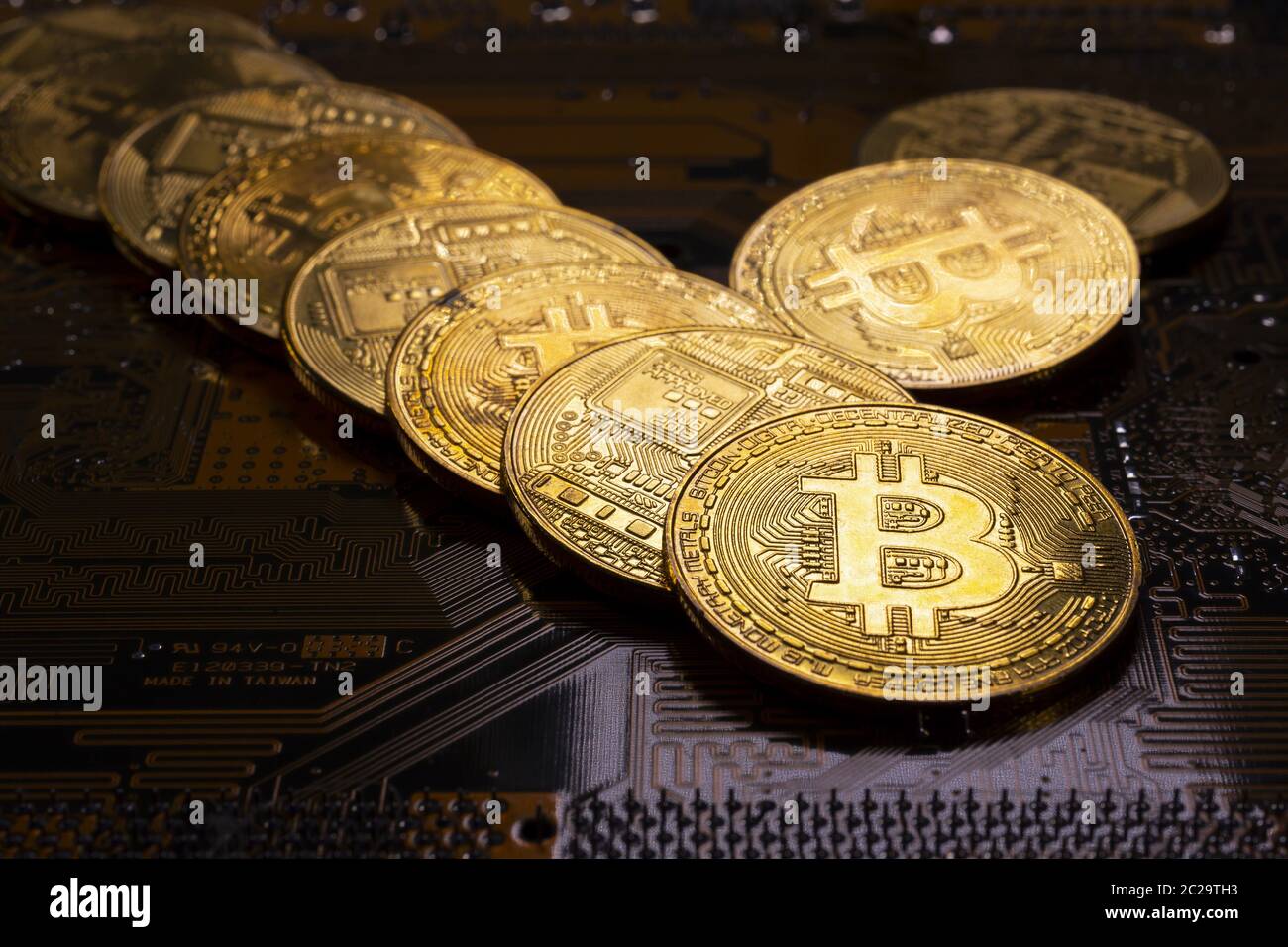Bitcoin coins and printed circuit board PCB Stock Photo - Alamy