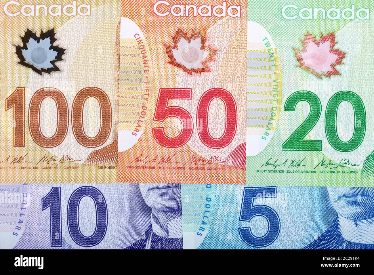 Canadian Dollars, a business background Stock Photo - Alamy