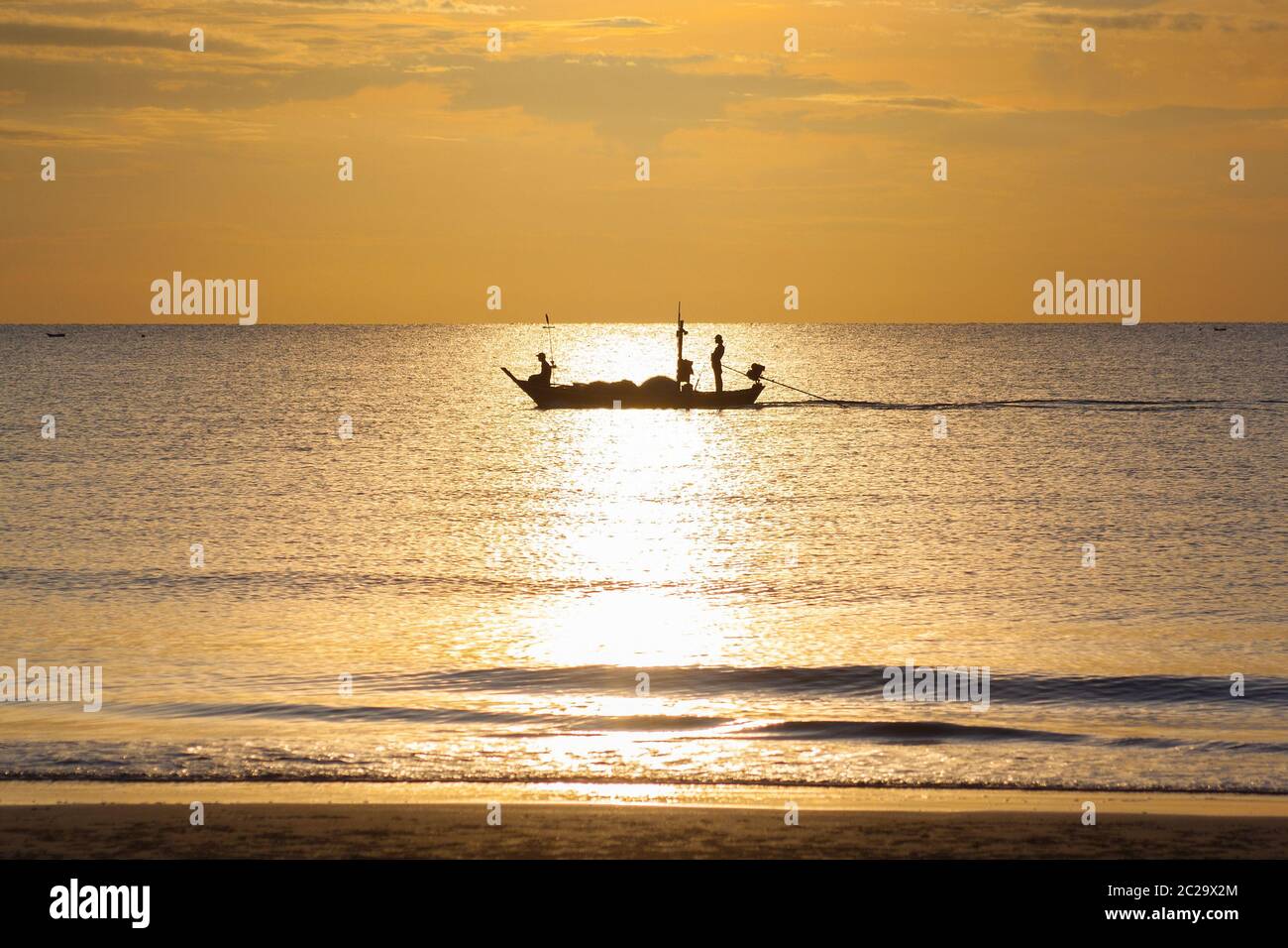 Silhouette of Thai Fishing Boat on sunrise Stock Photo - Alamy