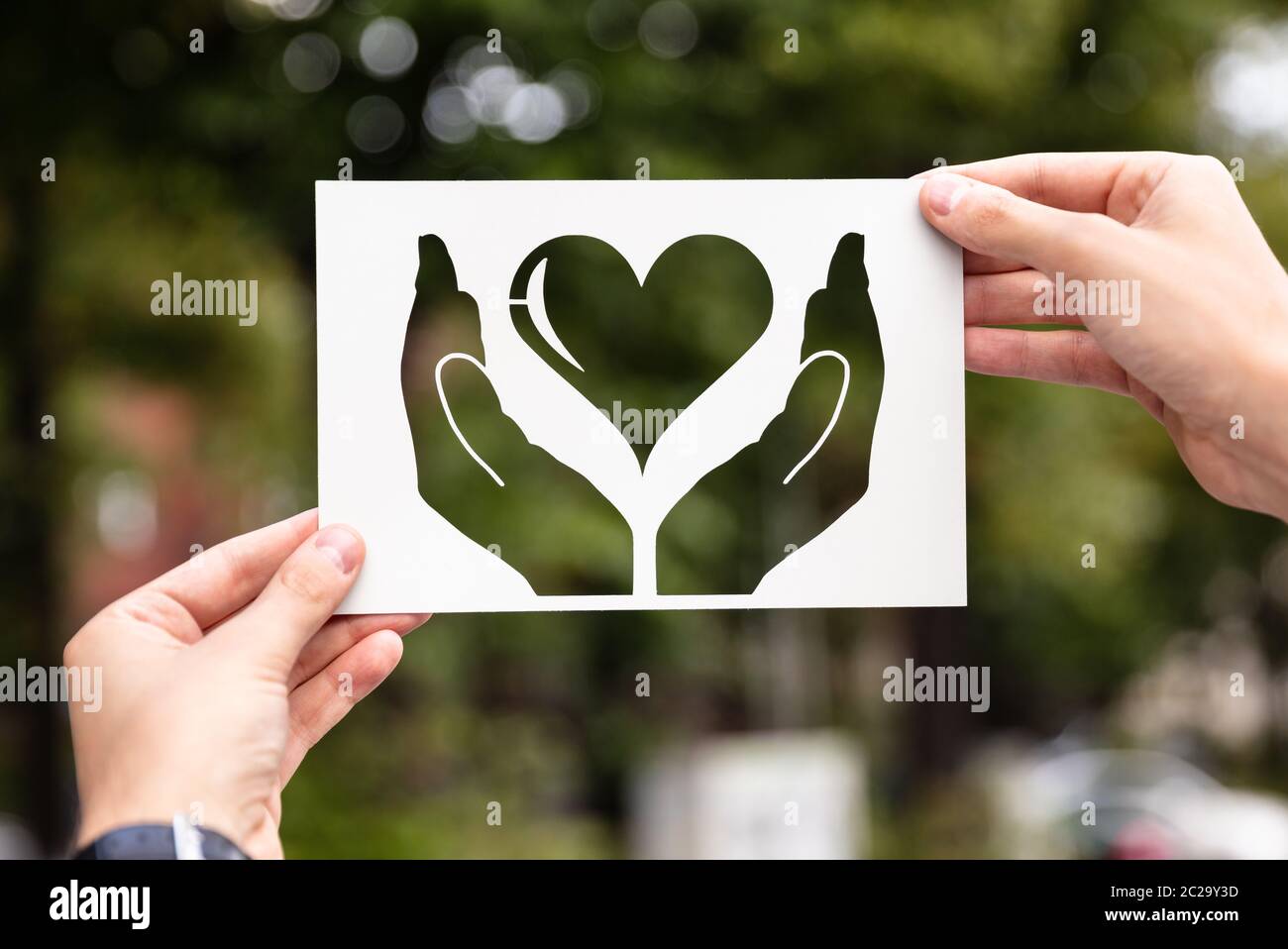 Protecting heart hi-res stock photography and images - Alamy