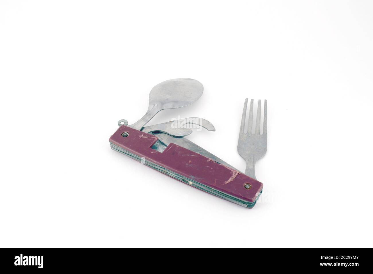 Old universal device with knife, spoon and fork Stock Photo - Alamy