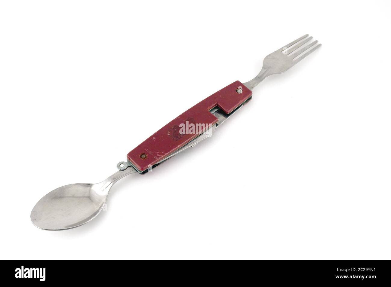 Old universal device with knife, spoon and fork Stock Photo - Alamy