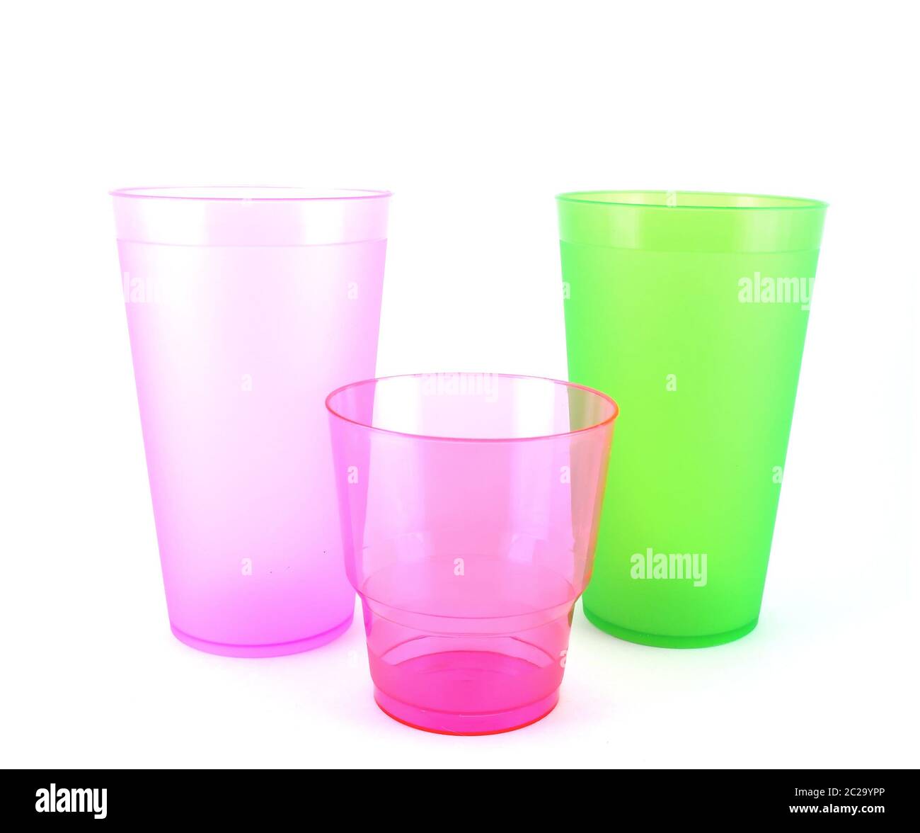 Green and pink cups over white Stock Photo - Alamy