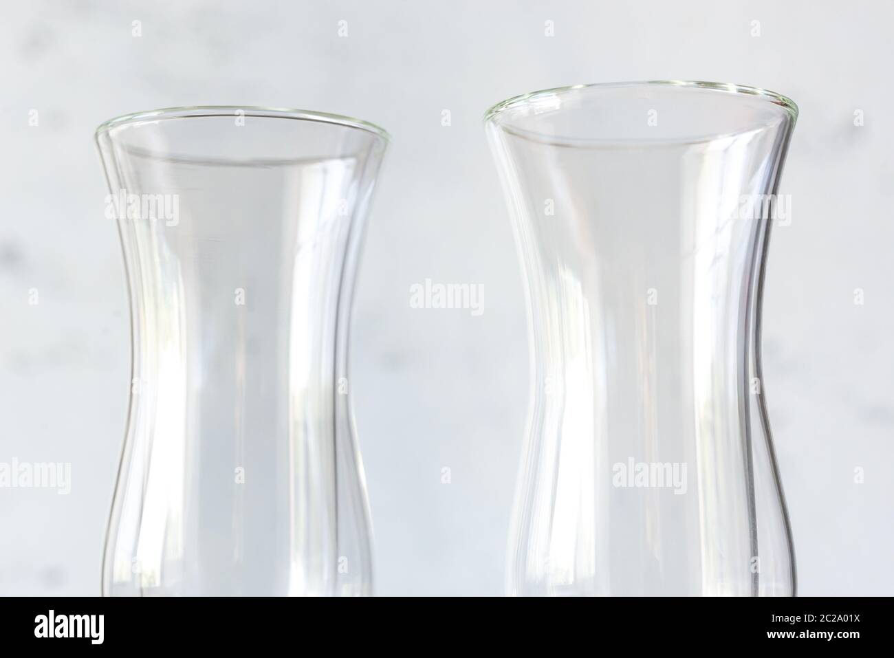 Empty double wall glasses isolated Stock Photo - Alamy