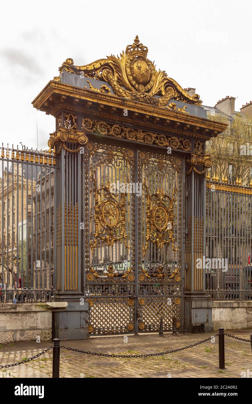 Paris, France - 1 April, 2017: Golden gate of palace of courthouse ...