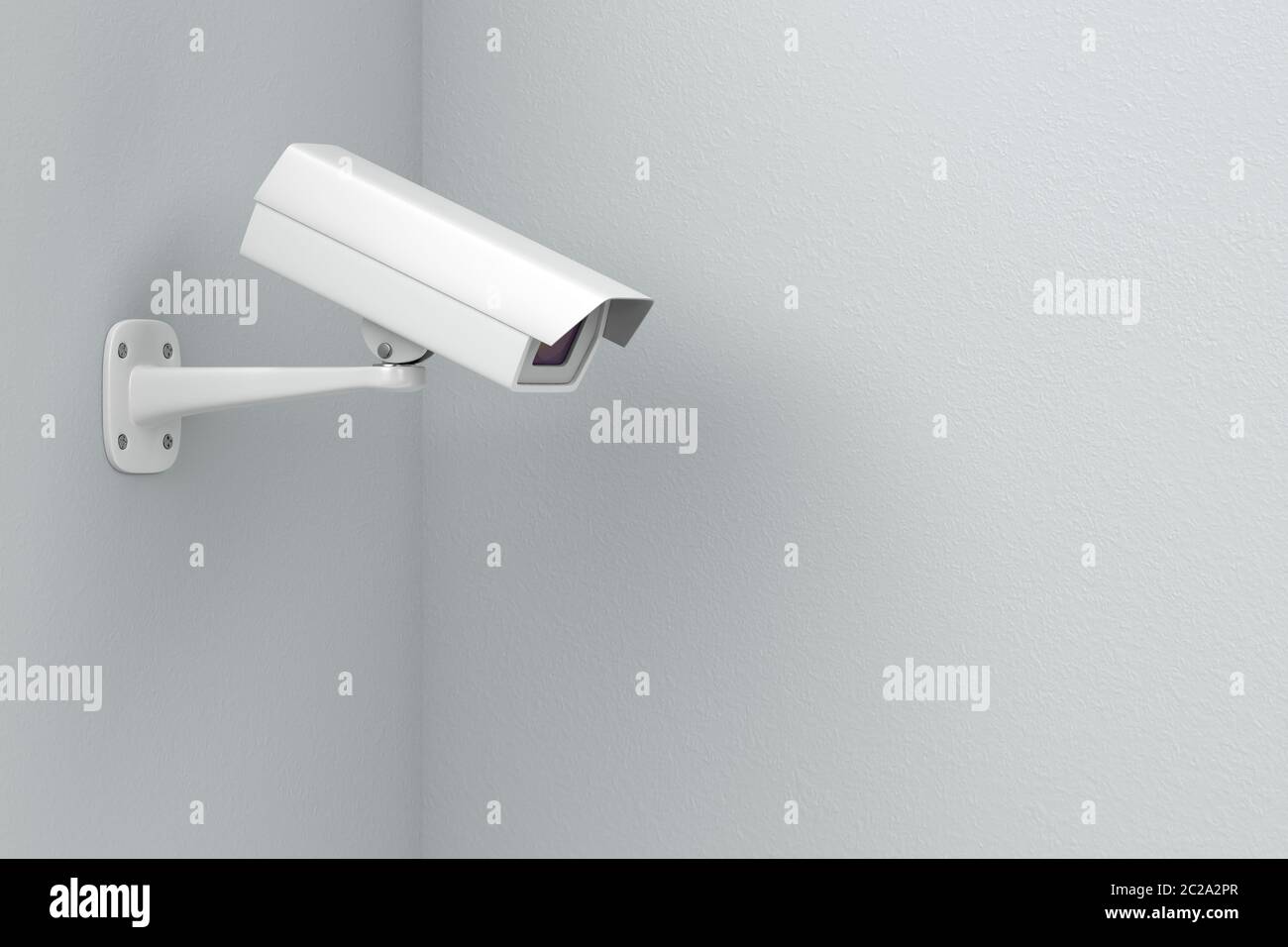 Security camera mounted on the wall Stock Photo - Alamy
