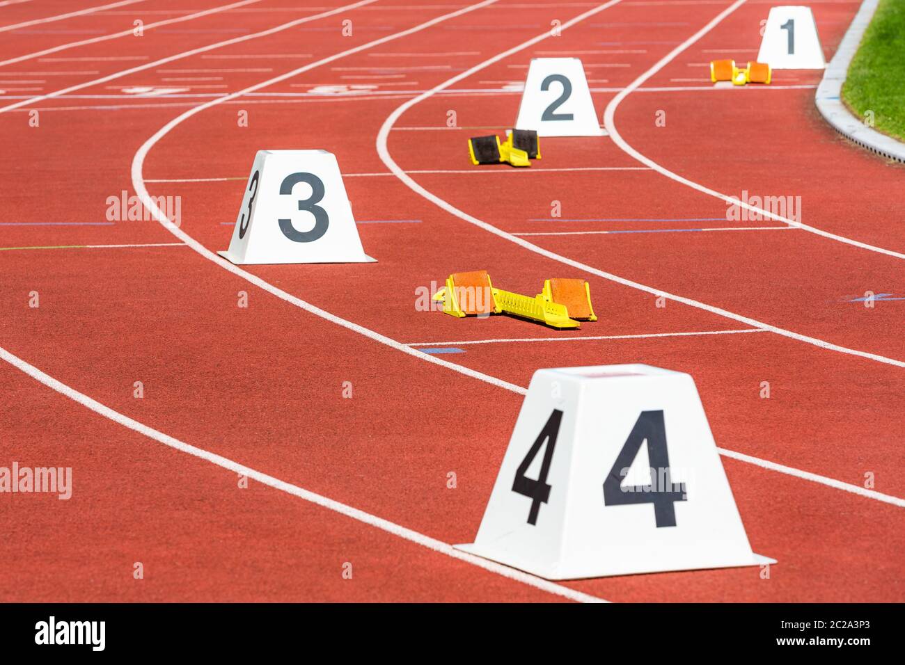tracks and numbers in stadium for 400 m run Stock Photo - Alamy