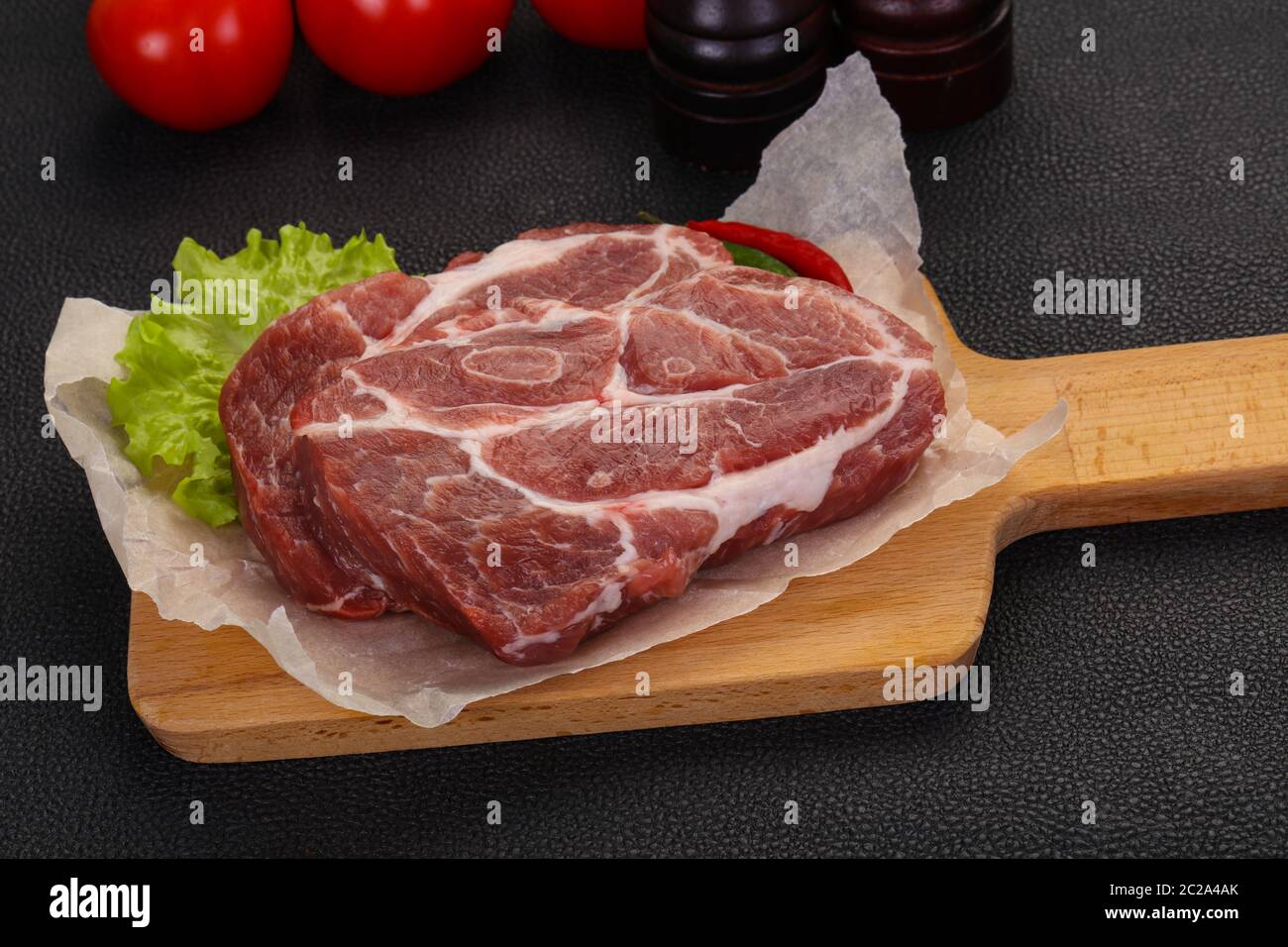 Raw pork neck steak ready for cooking Stock Photo - Alamy