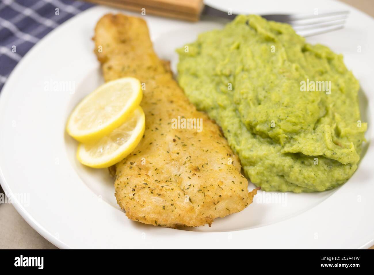 meunière fish fillet and green vegetable purée Stock Photo - Alamy
