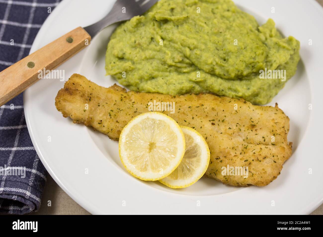 meunière fish fillet and green vegetable purée Stock Photo - Alamy