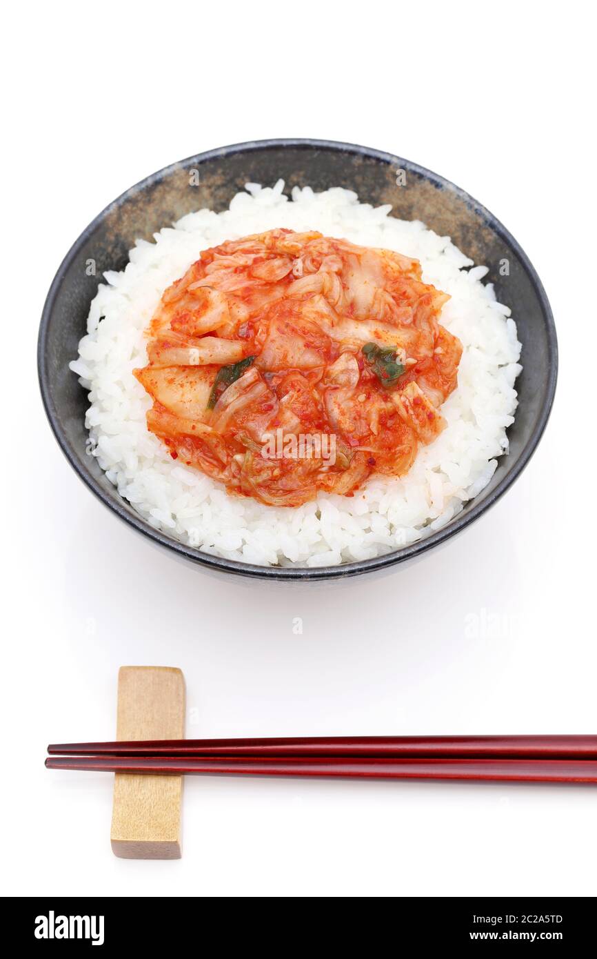 Korean food, cooked white rice with kimchi on white background Stock ...