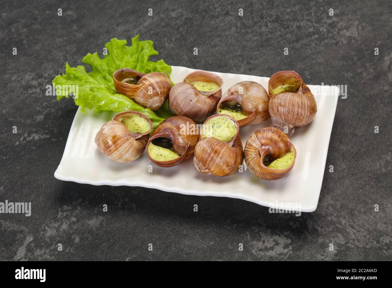 French cuisine - Escargot with butter sauce Stock Photo - Alamy