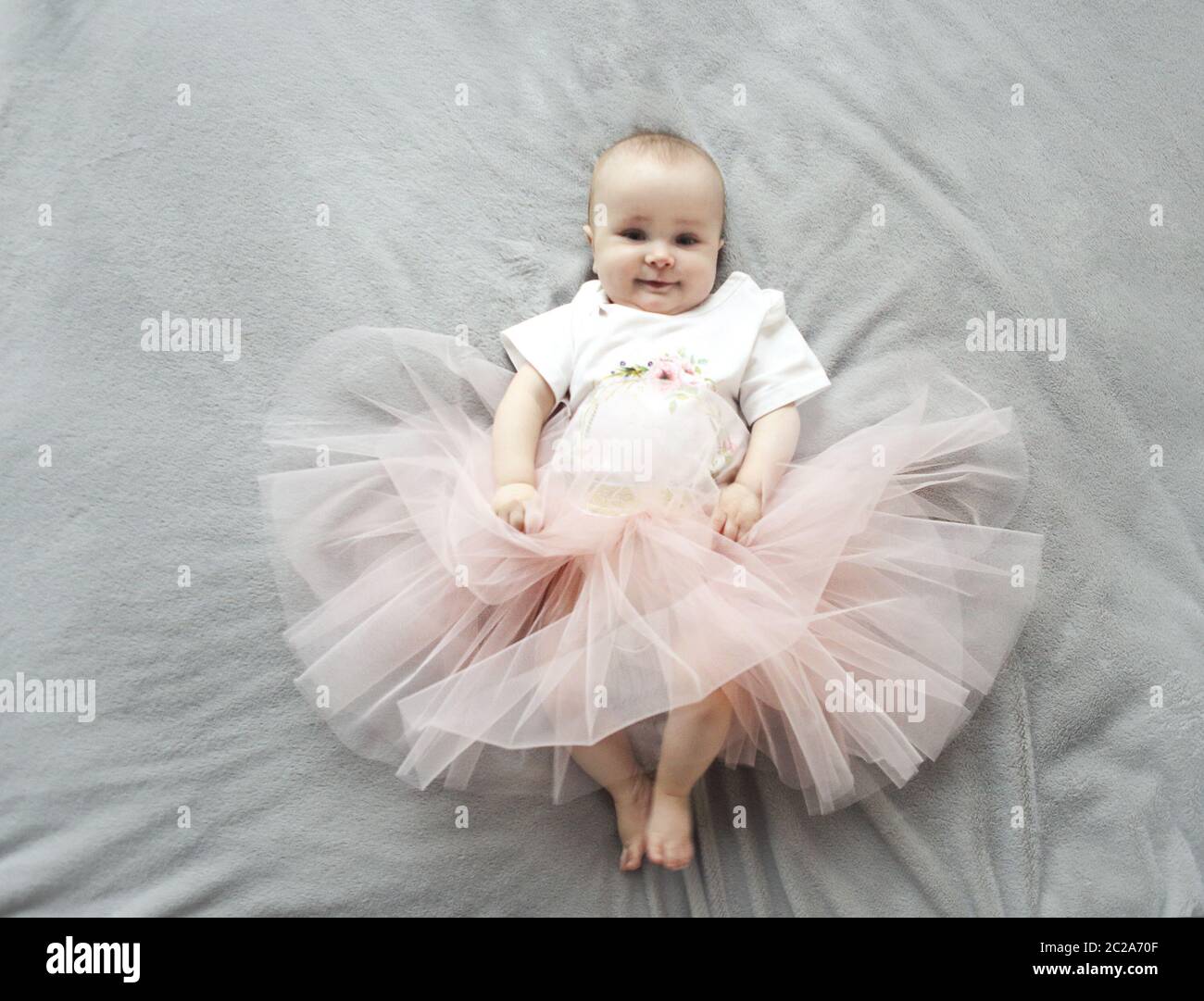 Adorable funny baby girl wearing tu-tu skirt Stock Photo - Alamy