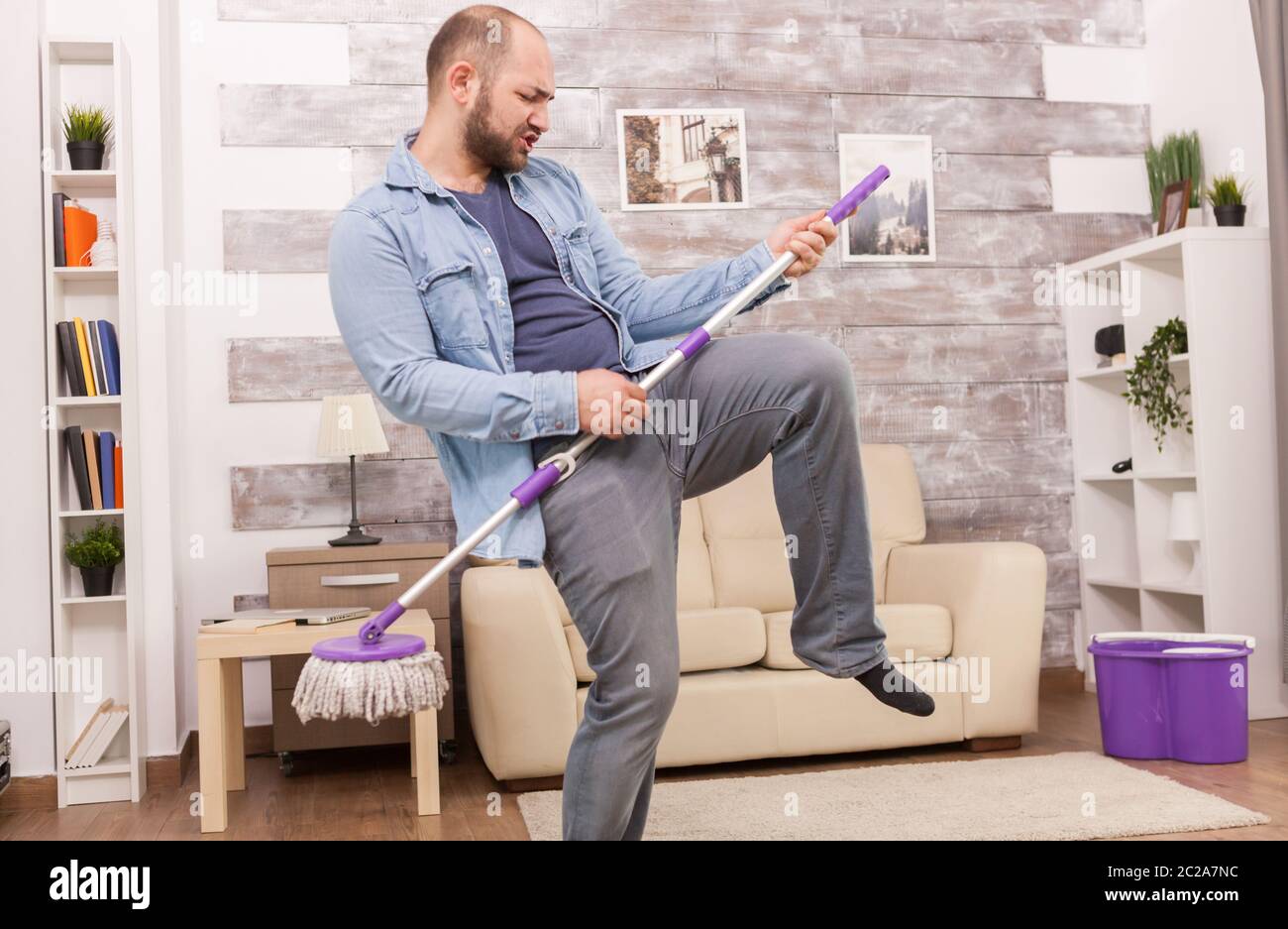Man mop funny hi-res stock photography and images - Alamy