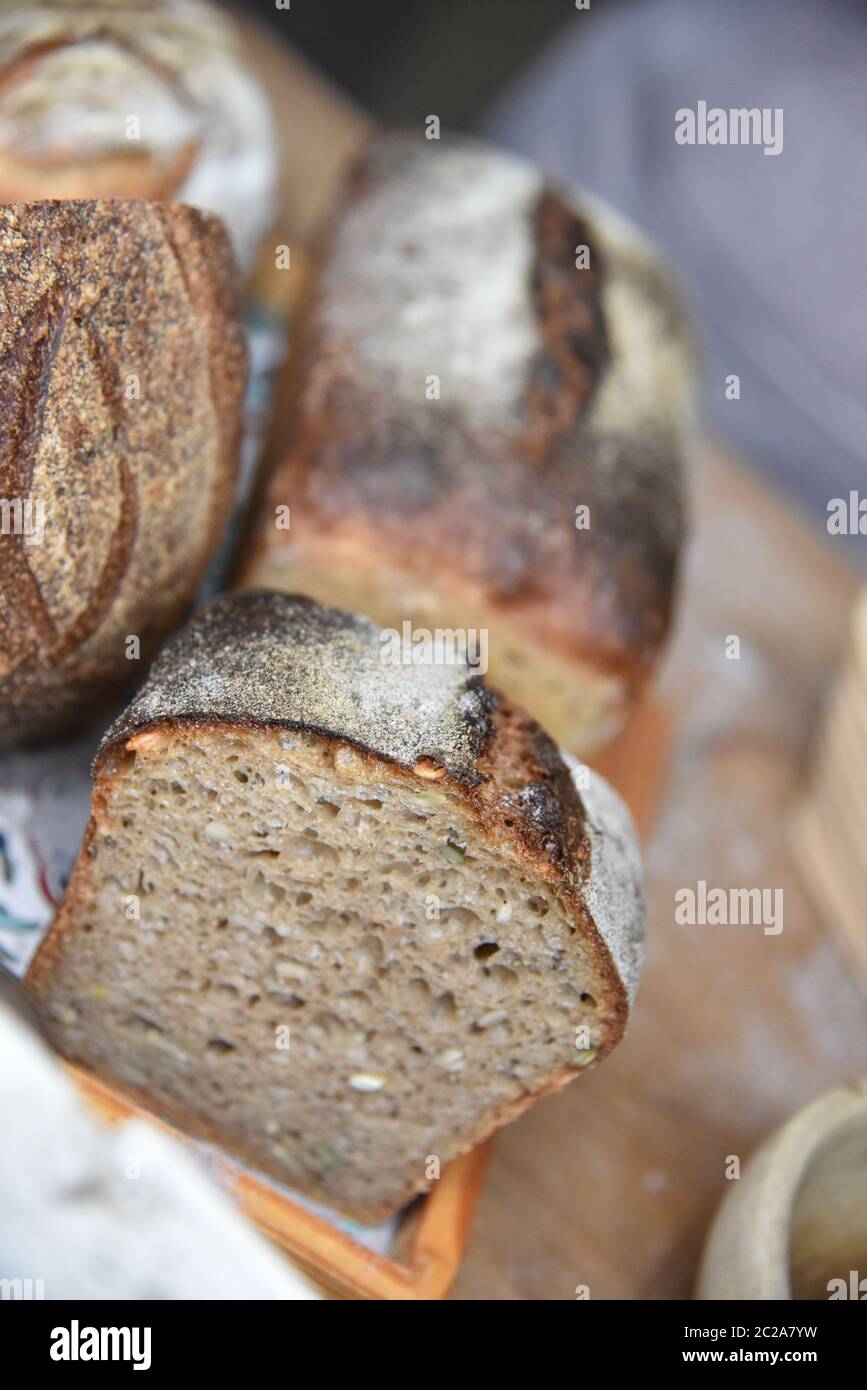 A fresh crusty loaf of homemade bread. Homemade rustic sour. Brown ...